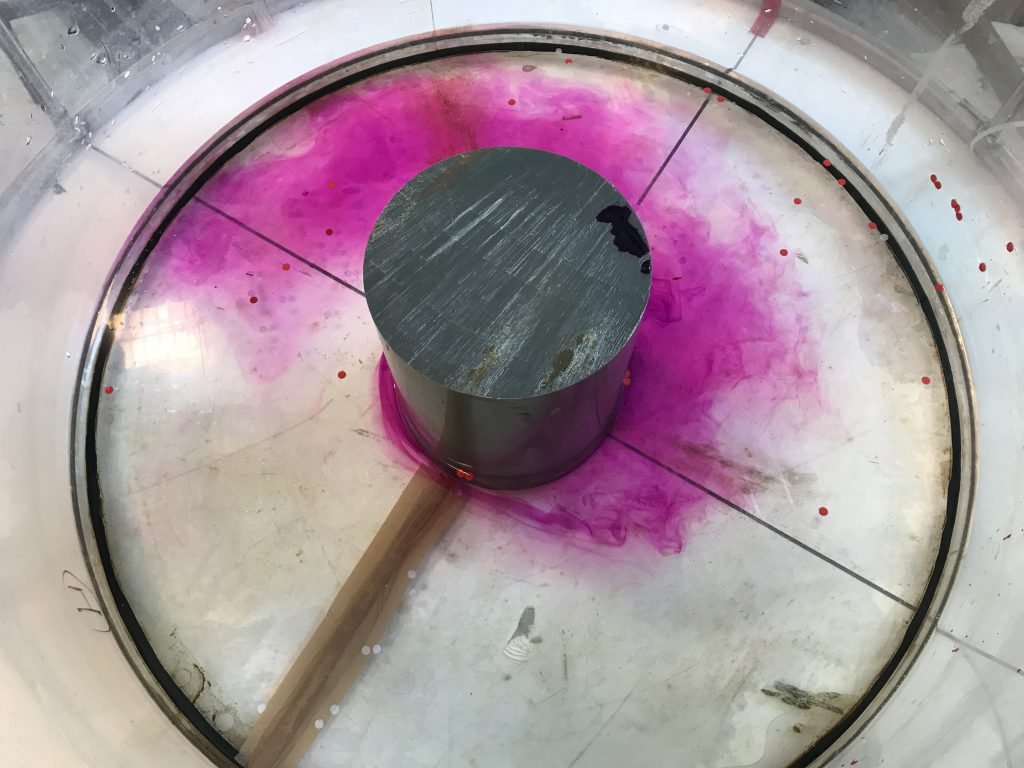 Topographic Rossby waves in a tank - Adventures in Oceanography and ...